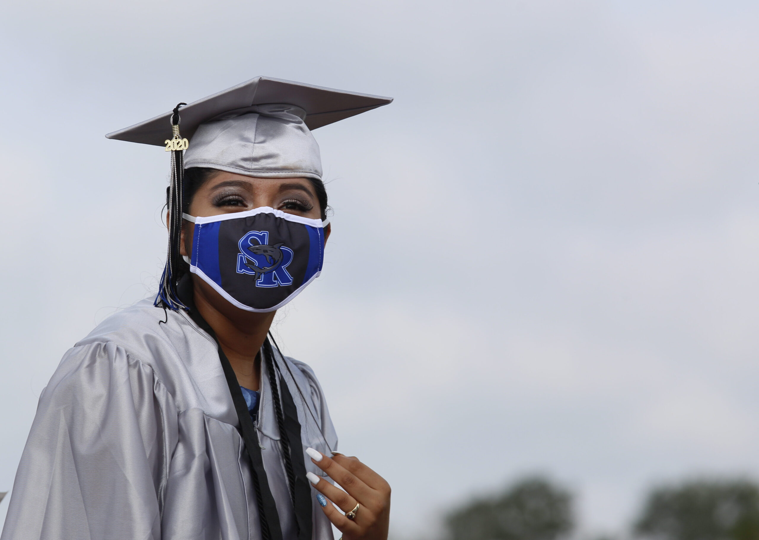 Photos - Traditional, drive-thru high school graduations - Vero News